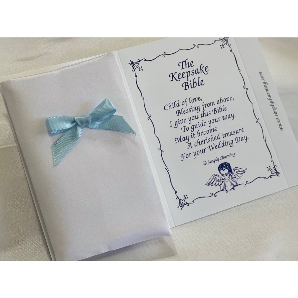 Simply Charming Satin Baby Bible with Blue Bow | shopnurseryrhymes